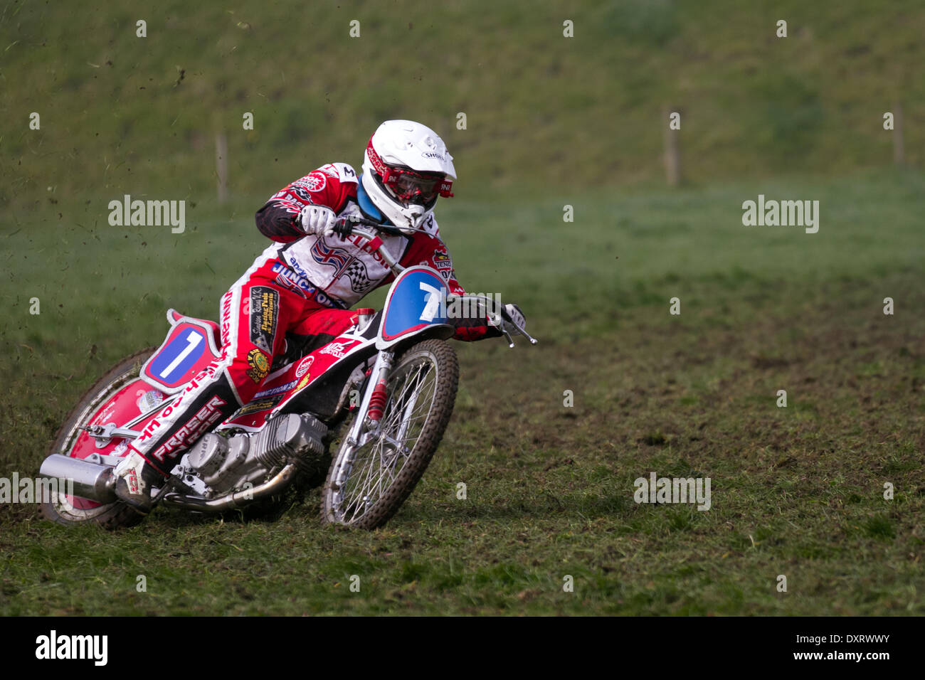 Youngsters grass track motorcycle riding in Much Hoole, Lancashire, UK ...