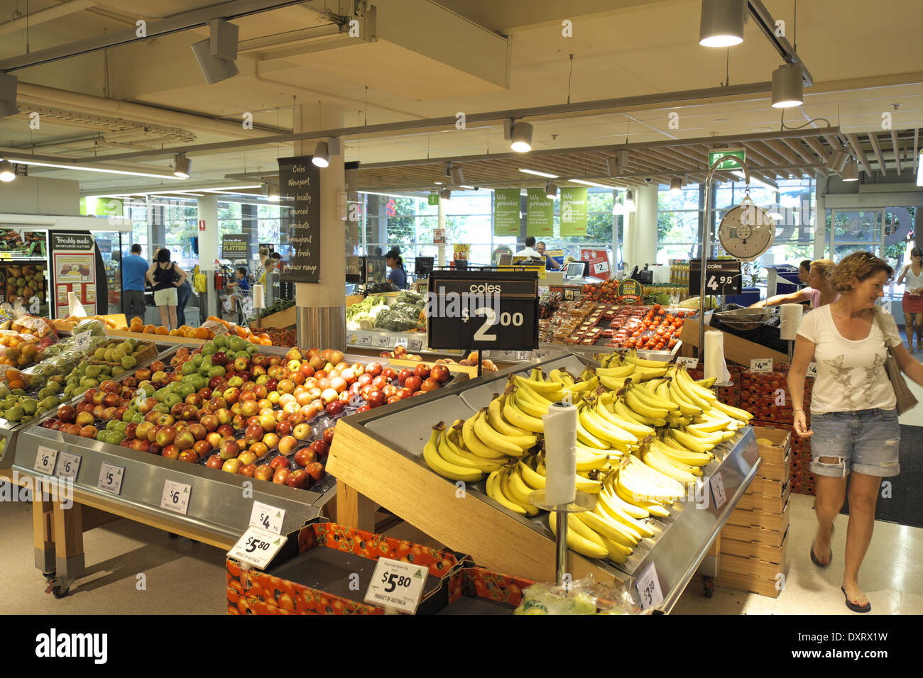 Lady woman shopping for fruit inside a Coles australian supermarket, in ...