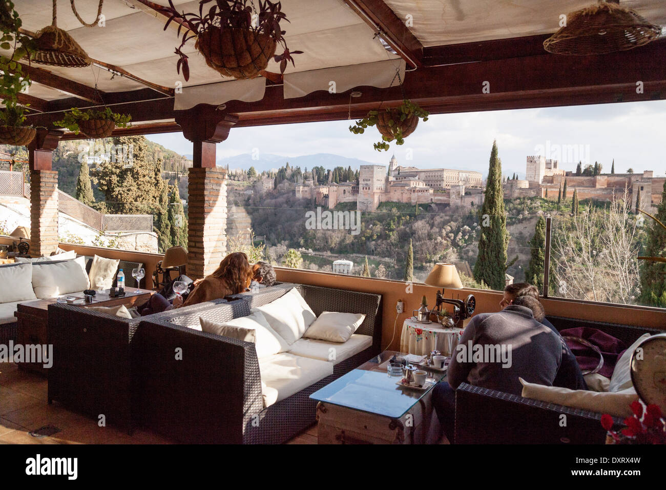 A view of the Alhambra Palace at sunset from a bar near the Plaza de St ...