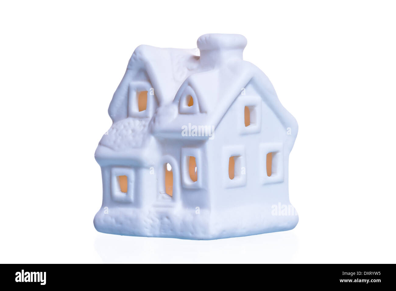 white ceramic souvenir house with glowing windows Stock Photo - Alamy