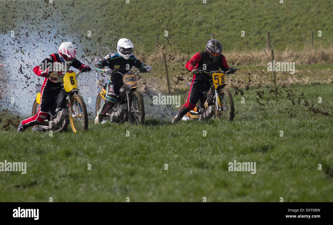 Youngsters grass track motorcycle riding in Much Hoole, Lancashire, UK ...