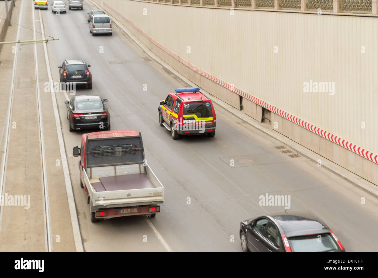 SMURD emergency vehicle exiting Victory underground passage, Bucharest ...
