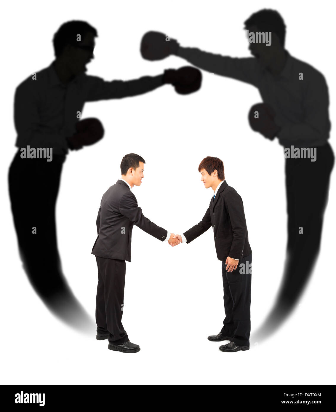 Two businessman handshake with fighting shadow Stock Photo - Alamy