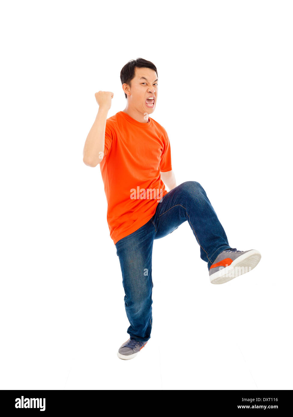 asian young man is dancing happily Stock Photo - Alamy