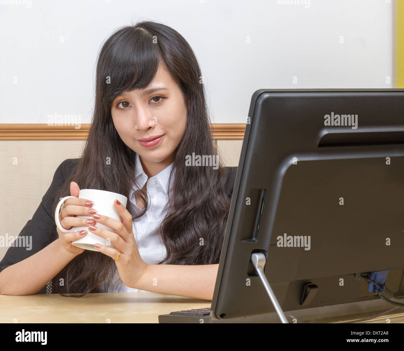 Happy successful businesswoman drinking coffee hi-res stock photography ...