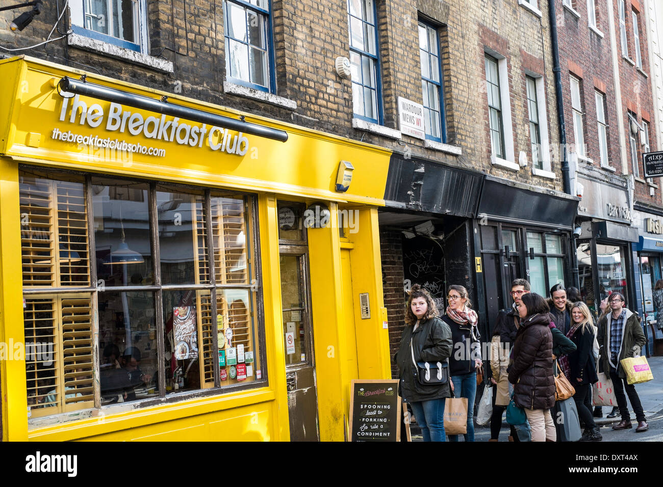 breakfast club popular cafe bar London UK Stock Photo - Alamy