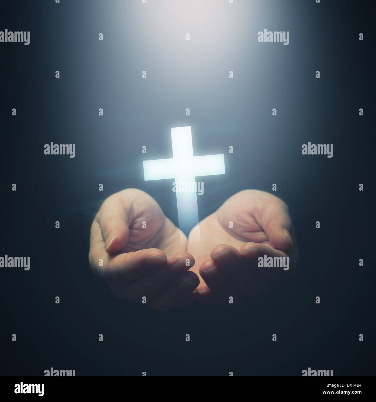 Hands holding cross hi-res stock photography and images - Alamy