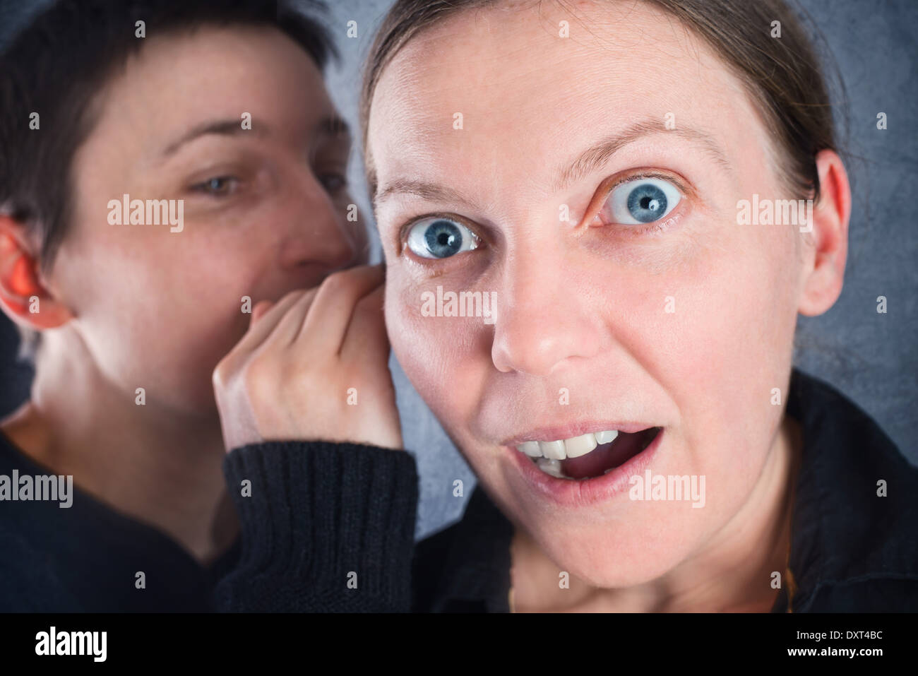 Telling secrets hi-res stock photography and images - Alamy