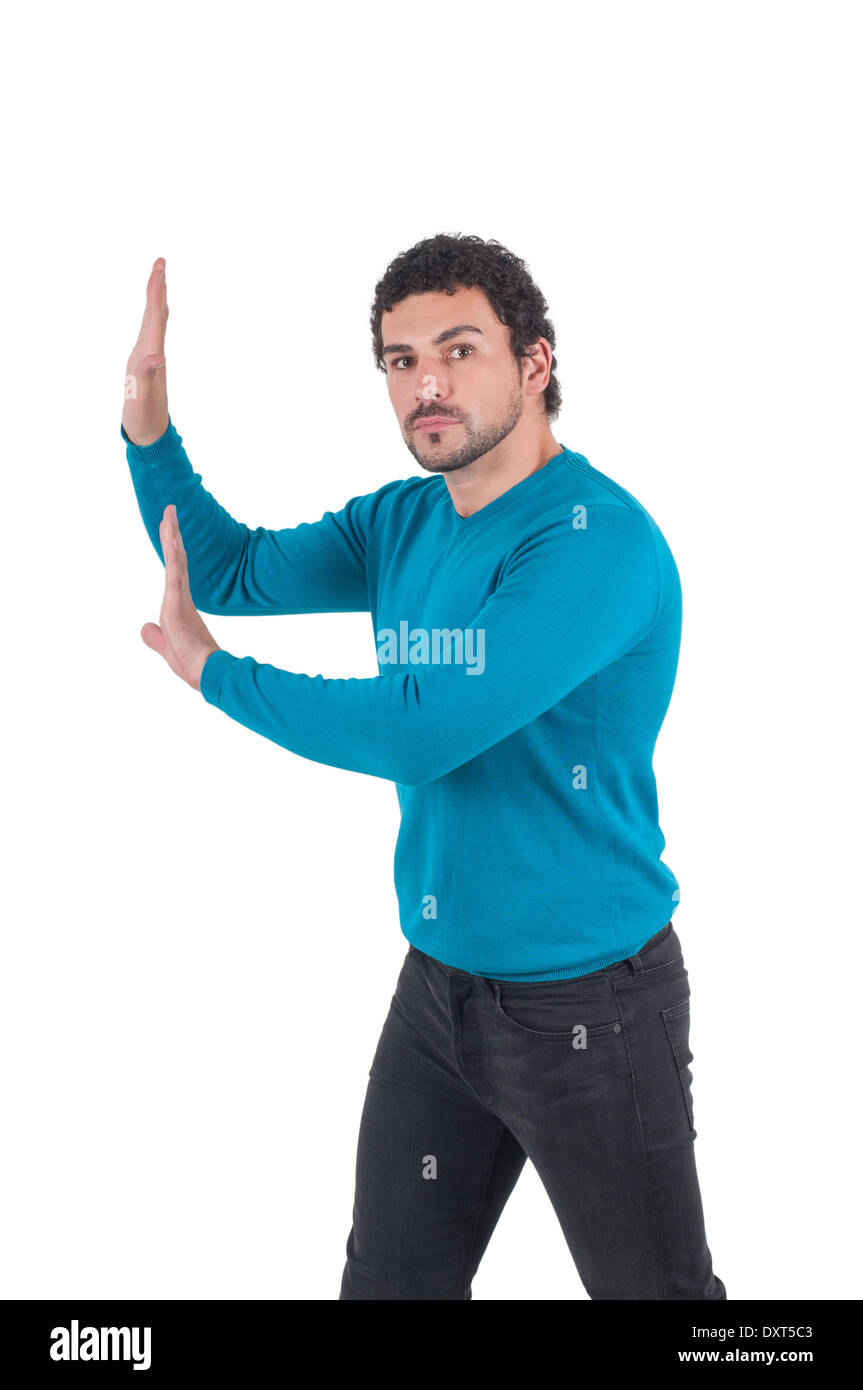 Guy pushing invisible wall Stock Photo - Alamy