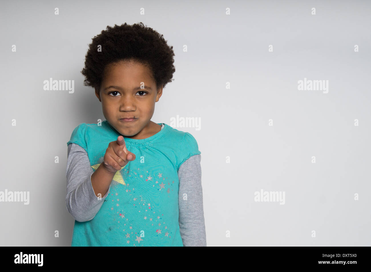A young angry girl accuses someone Stock Photo - Alamy
