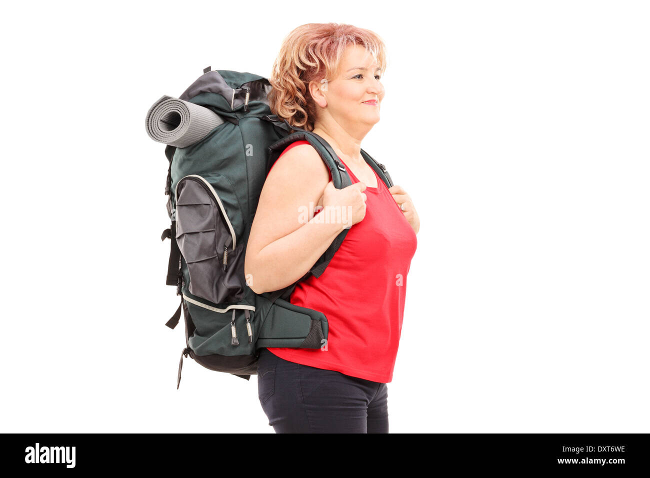 Mature woman, walking with backpack Stock Photo - Alamy