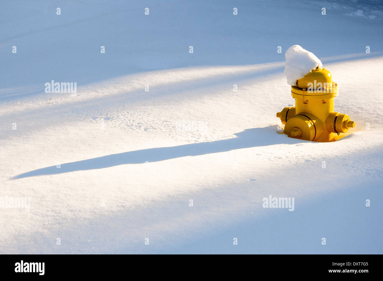 Snow coverer fire Hydrant Stock Photo - Alamy