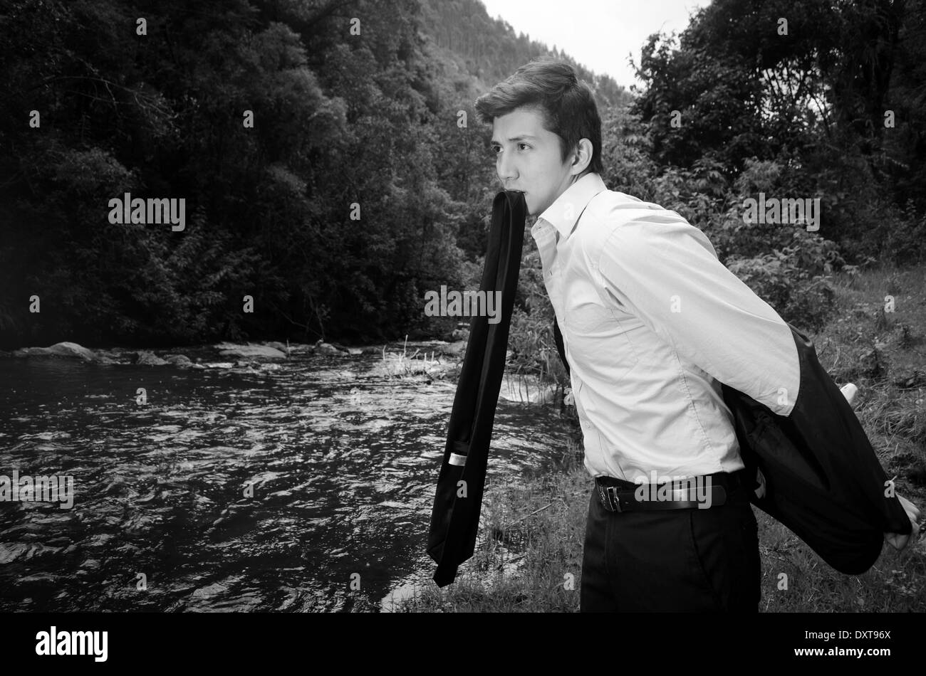 man wearing suit outdoors in the forest Stock Photo - Alamy