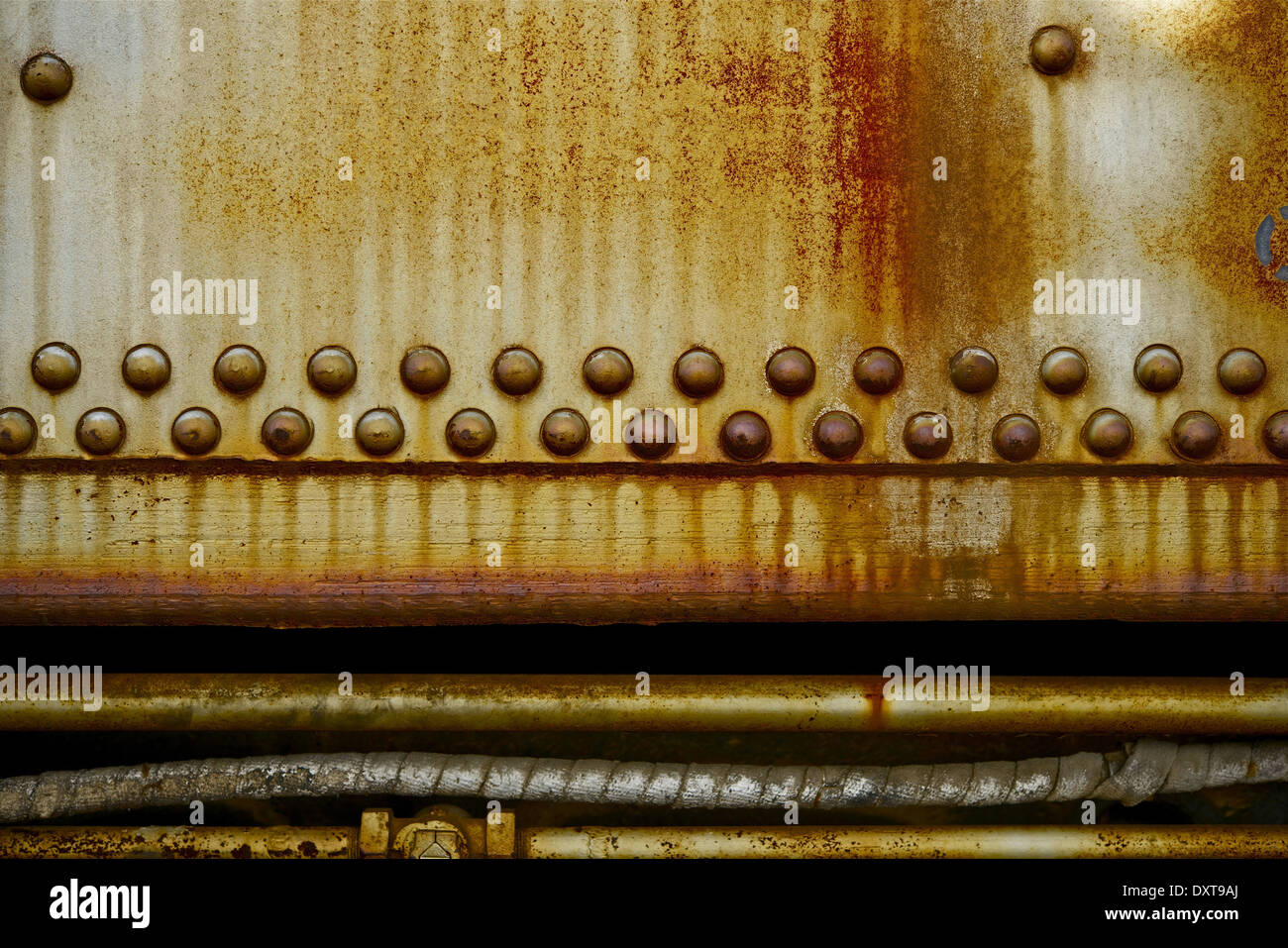Rusty Industrial Background with Rusty Pipes and Cables. Corroded Metal ...
