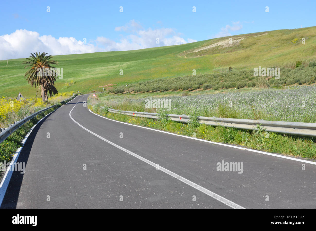 An Australian cyclist touring Sicily riding on the Strada Statale 187 ...