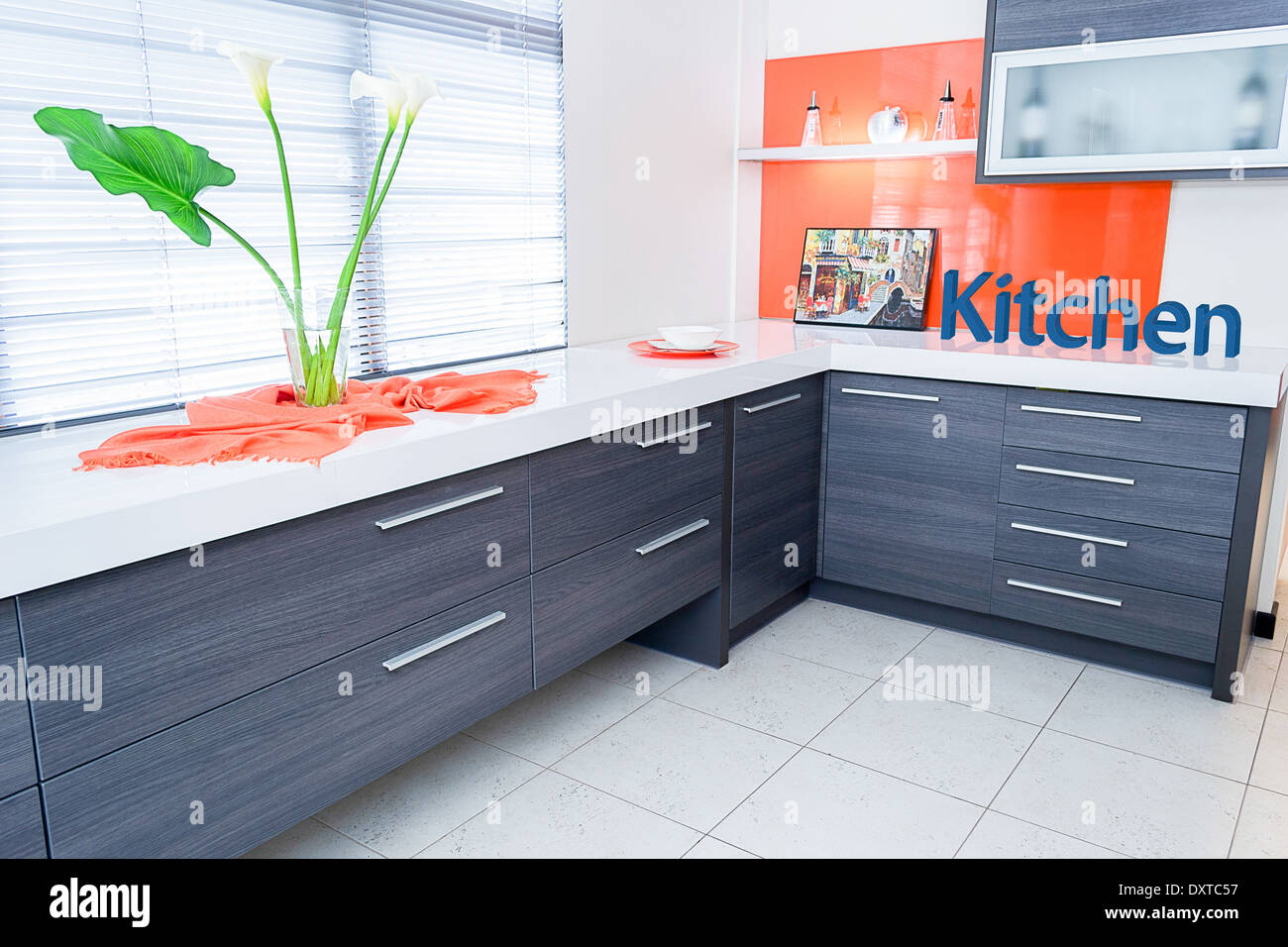 Modern white kitchen clean interior design with sign Stock Photo - Alamy