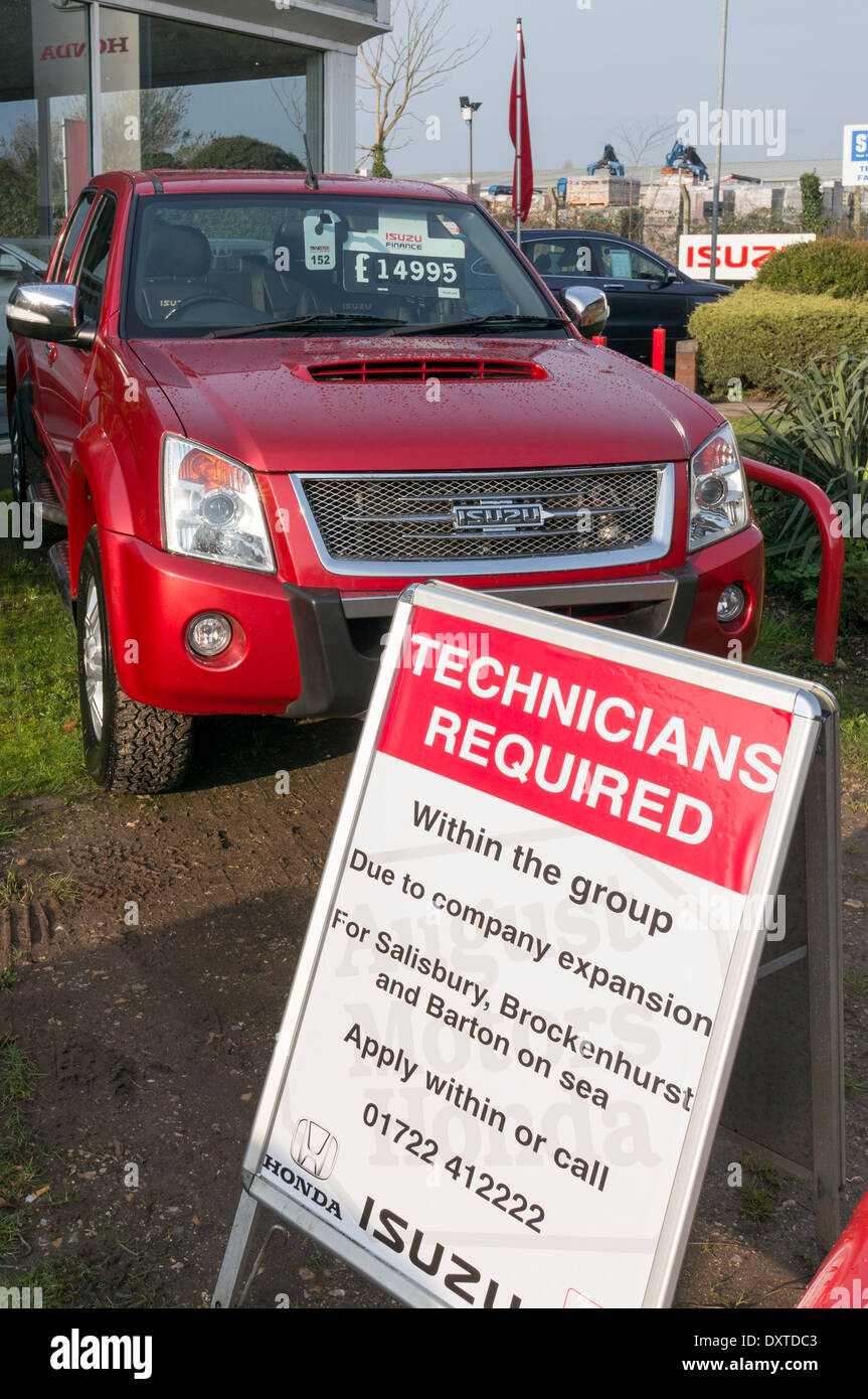 Situation vacant technicians required sign outside UK Isuzu car dealer ...