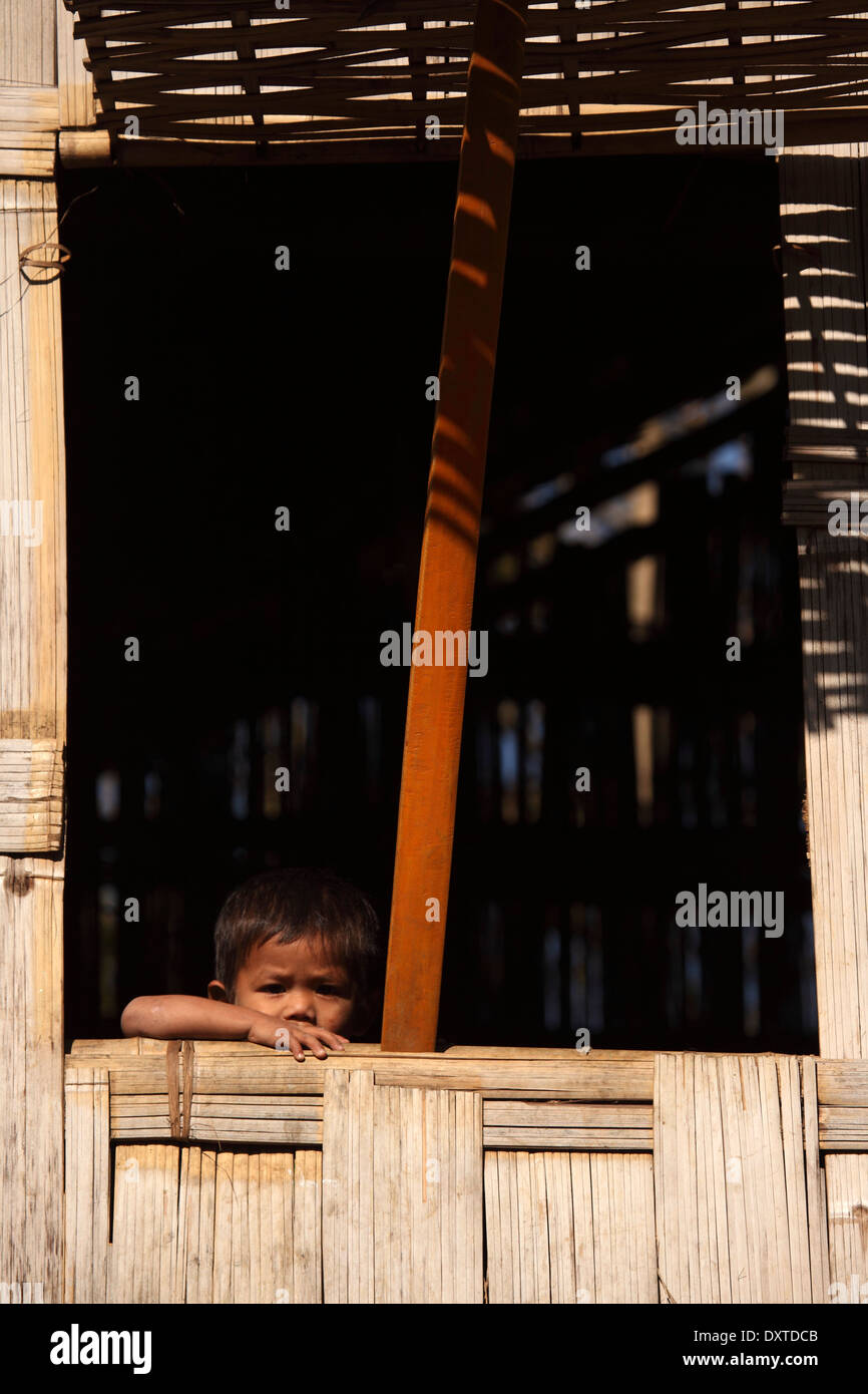 Child peeking window hi-res stock photography and images - Alamy