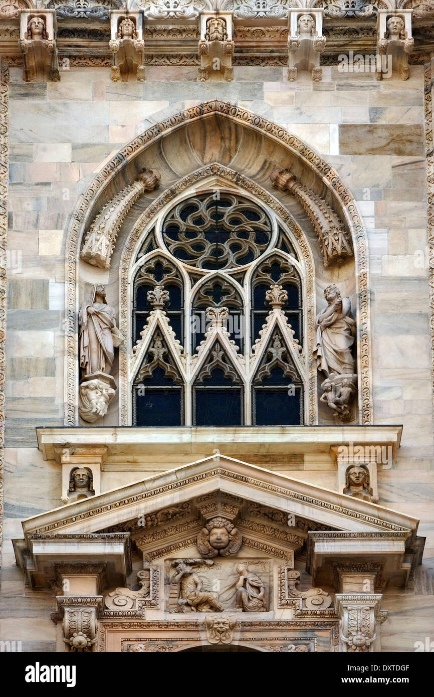 italy statues of a men in the front of the duomo church in milan and ...