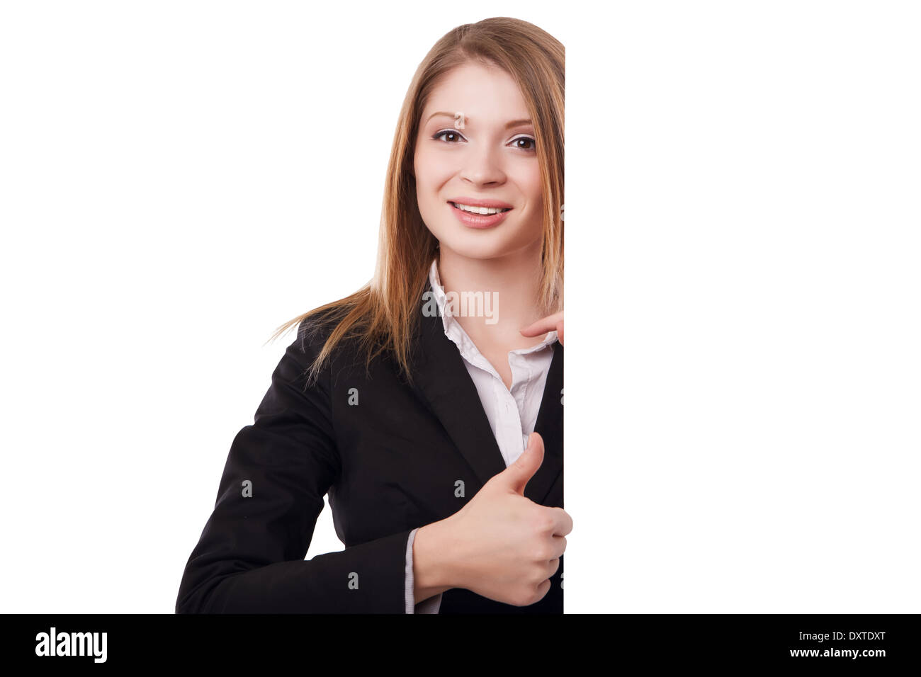 Happy smiling beautiful young woman showing blank signboard or copyspace, isolated over white ...