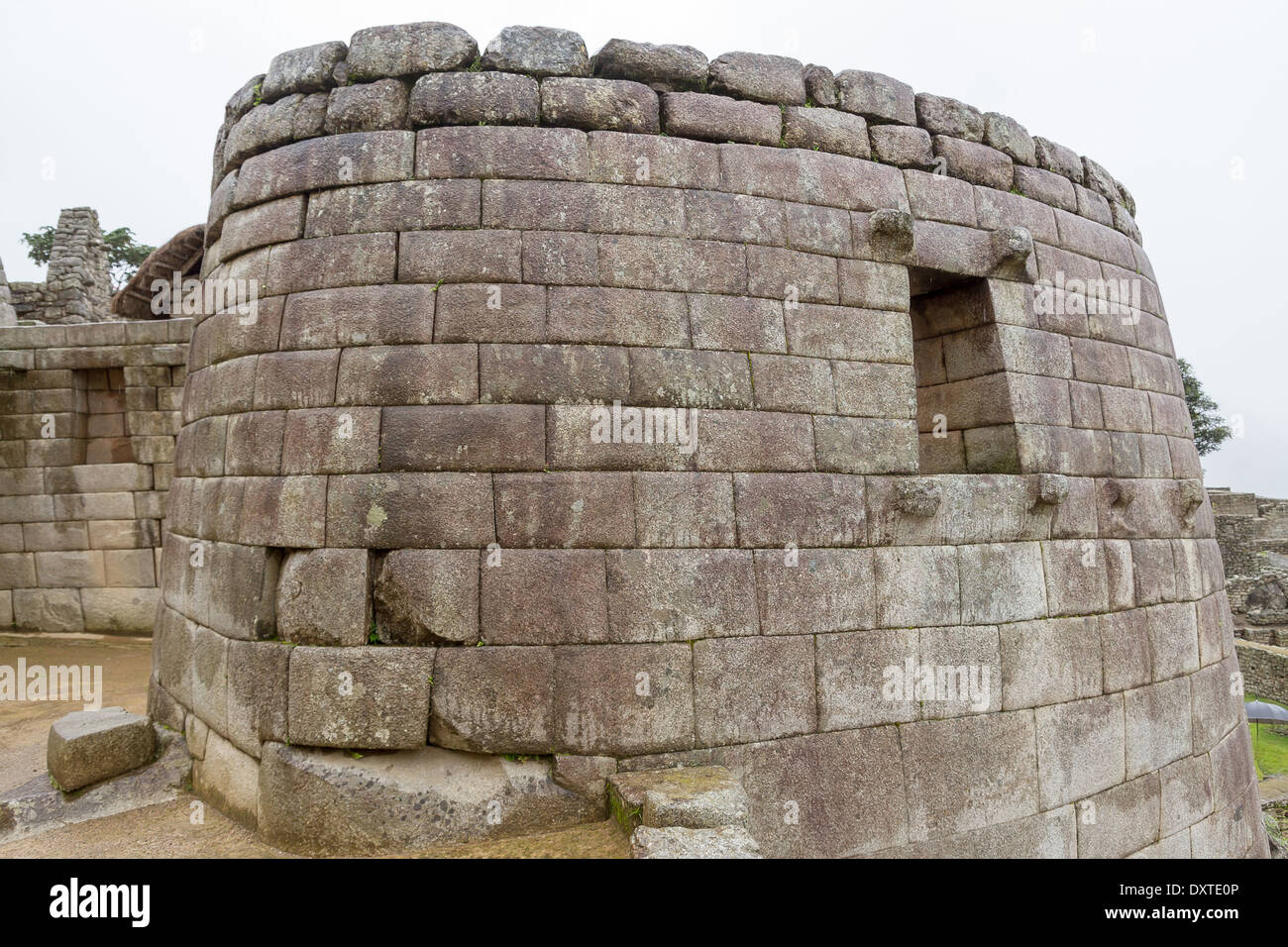 Ruins of Sun temple in Machu Picchu city Stock Photo - Alamy