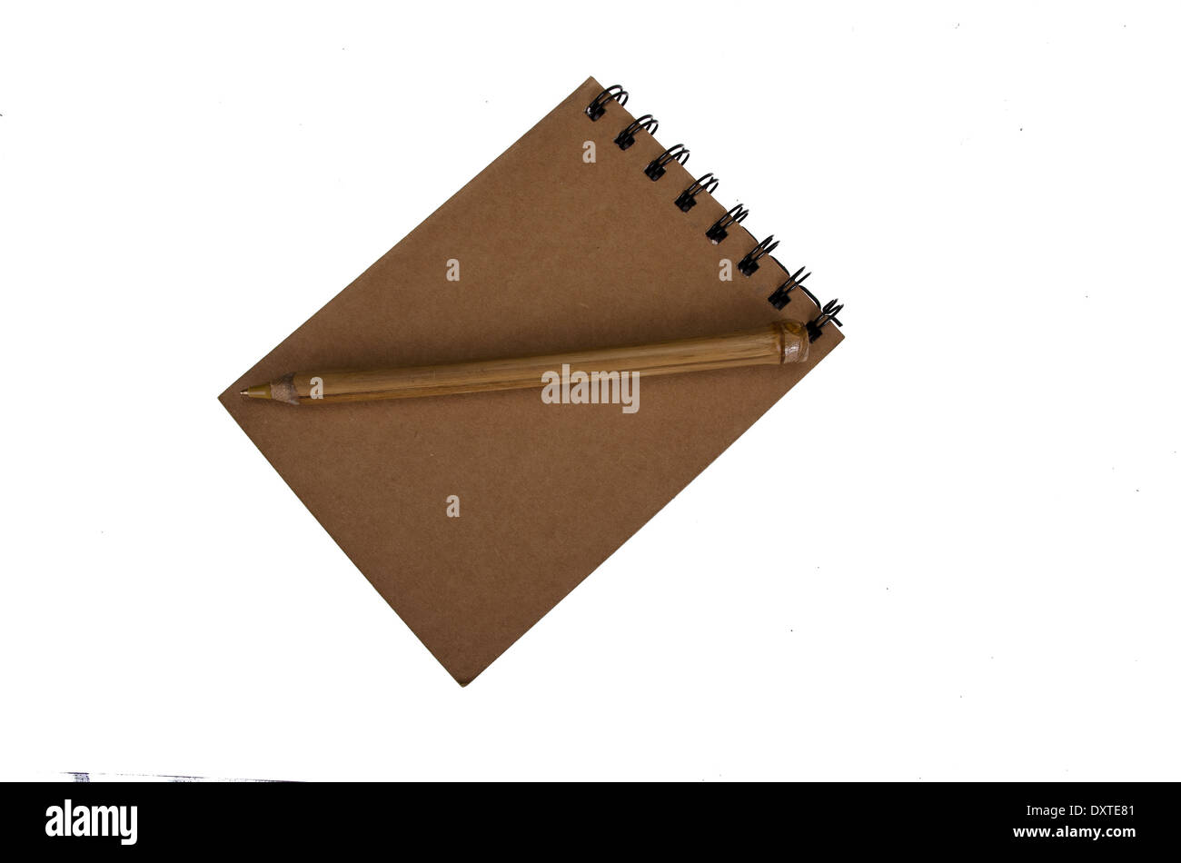 Recycled paper blank notepad with pen on white background Stock Photo ...