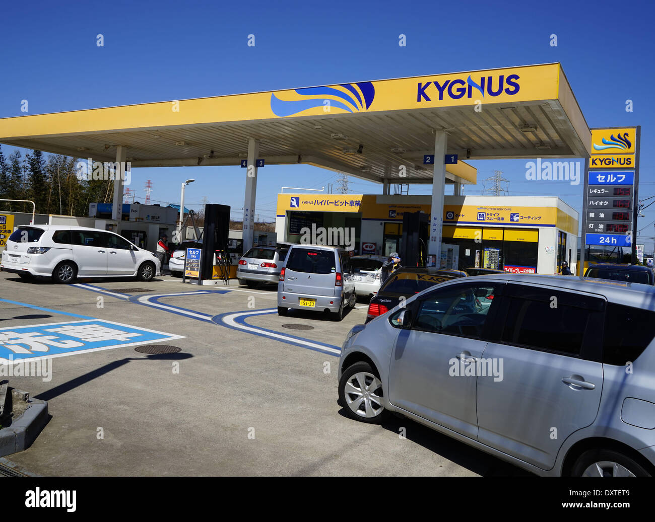 Tokyo, Japan. 3rd Mar, 2014. Business at suburban self-service gas ...