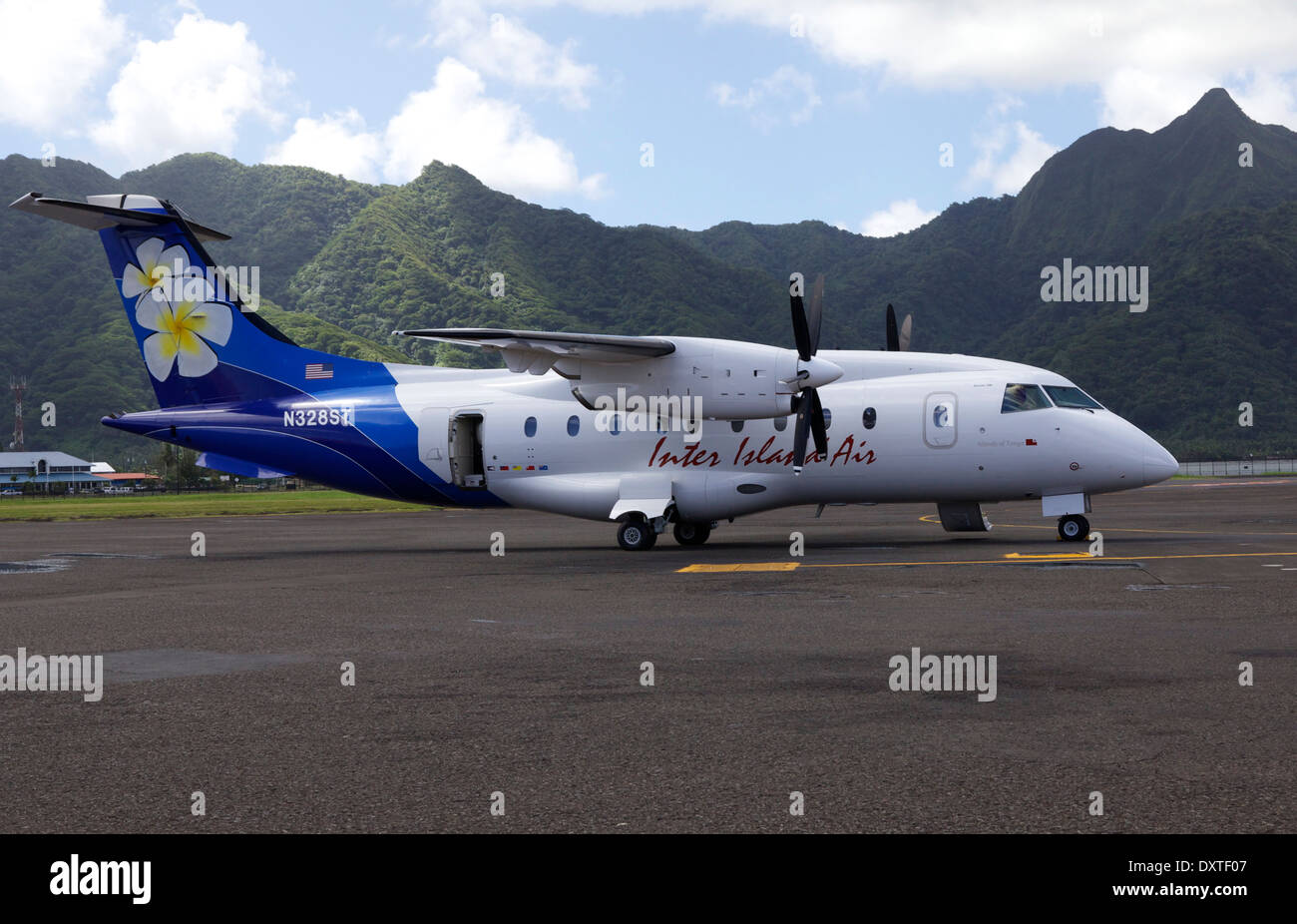 A plane of Inter Island Air flies into American Samoa airport Stock ...