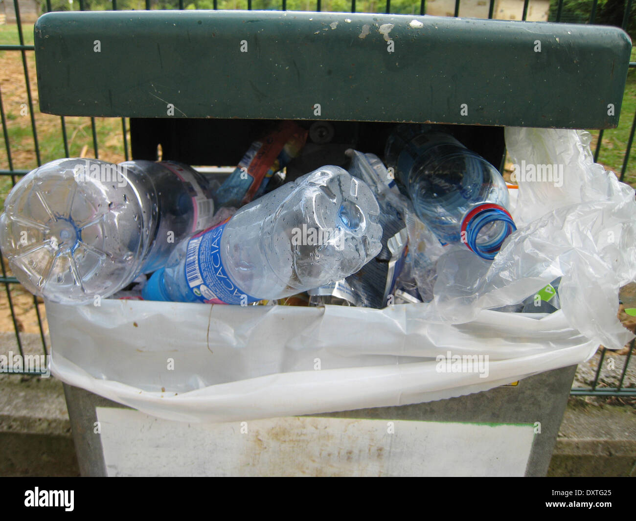 Overflowing public wastebin with plastic bottles Stock Photo - Alamy