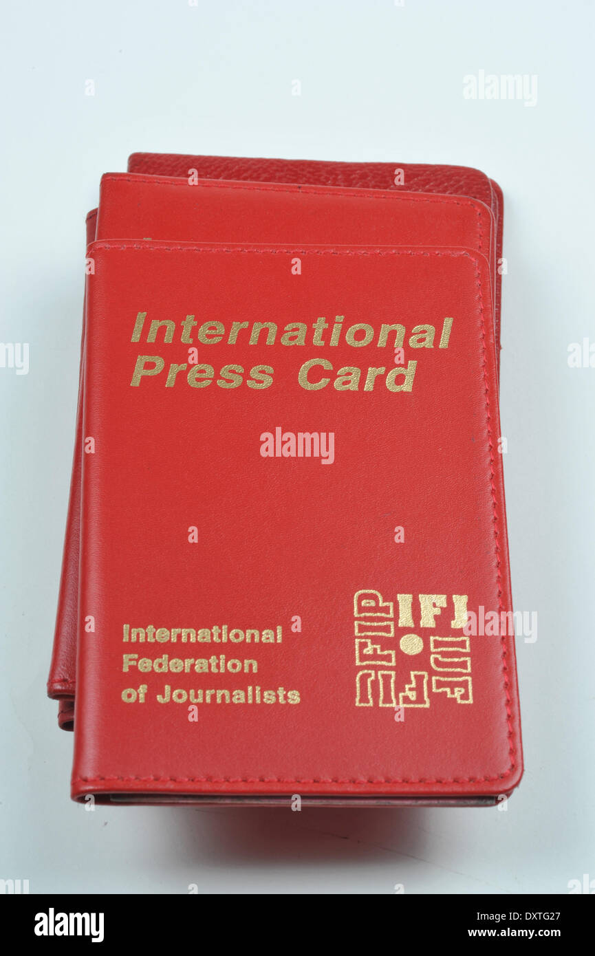 Several press credentials with light background. Those credentials are ...