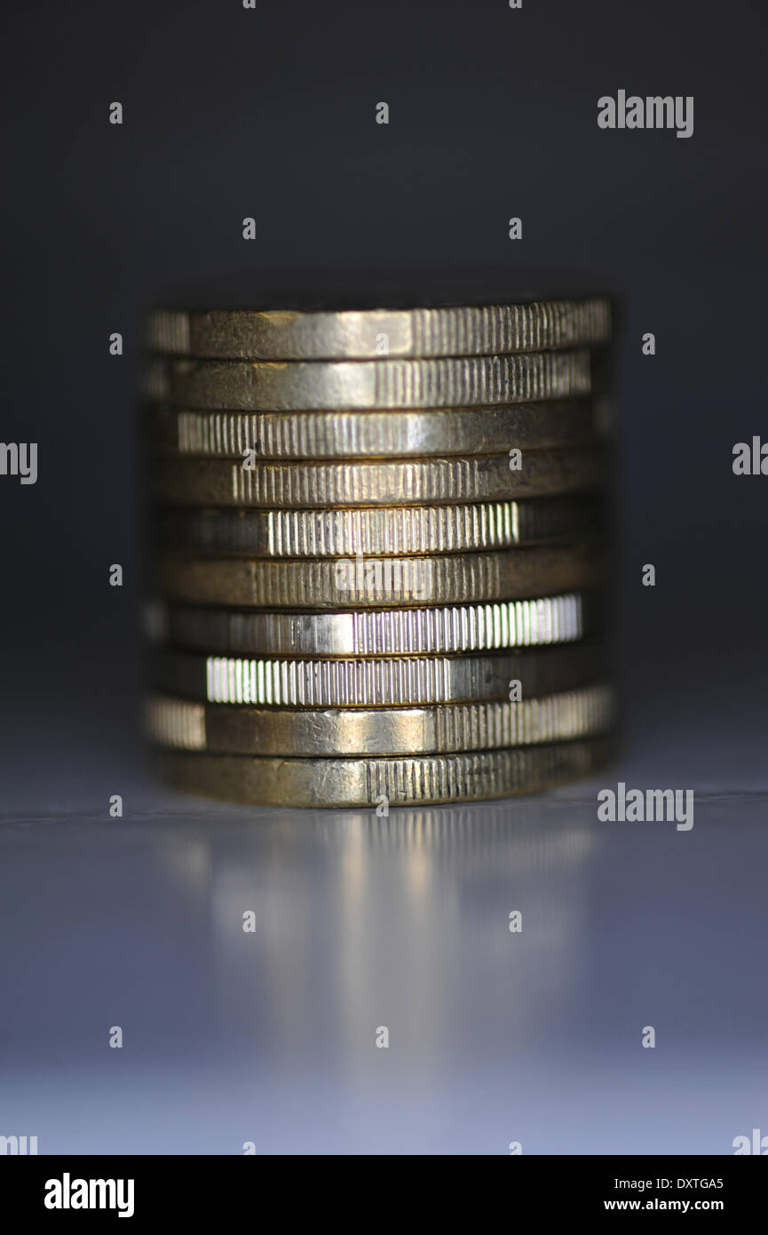 A small pile of coins Stock Photo - Alamy