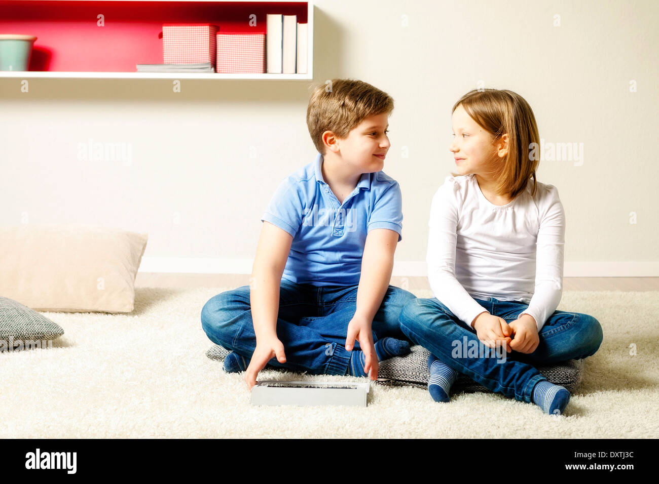 Children use tablet hi-res stock photography and images - Alamy