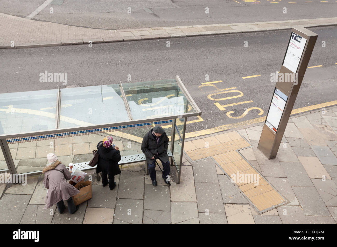People waiting at a bus stop in Sheffield, Yorkshire, England, UK Stock ...