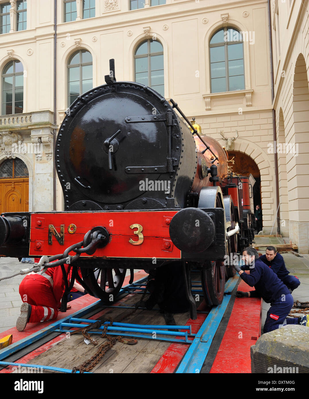Dresden, Germany. 31st Mar, 2014. Specialists unload historic steam ...