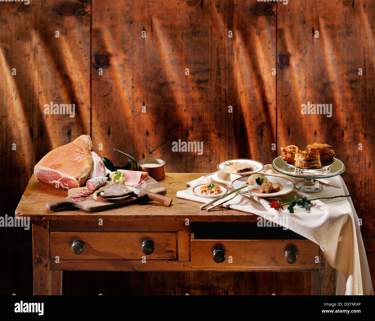 Butcher's block and assorted dishes and meat Stock Photo - Alamy