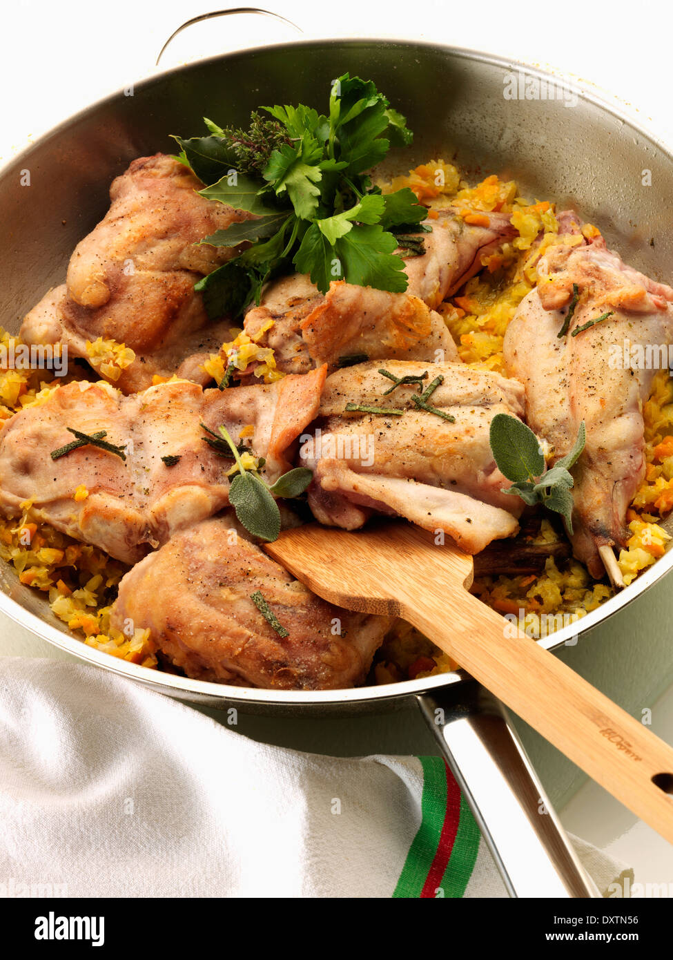 Cooking rabbit in a frying pan Stock Photo - Alamy