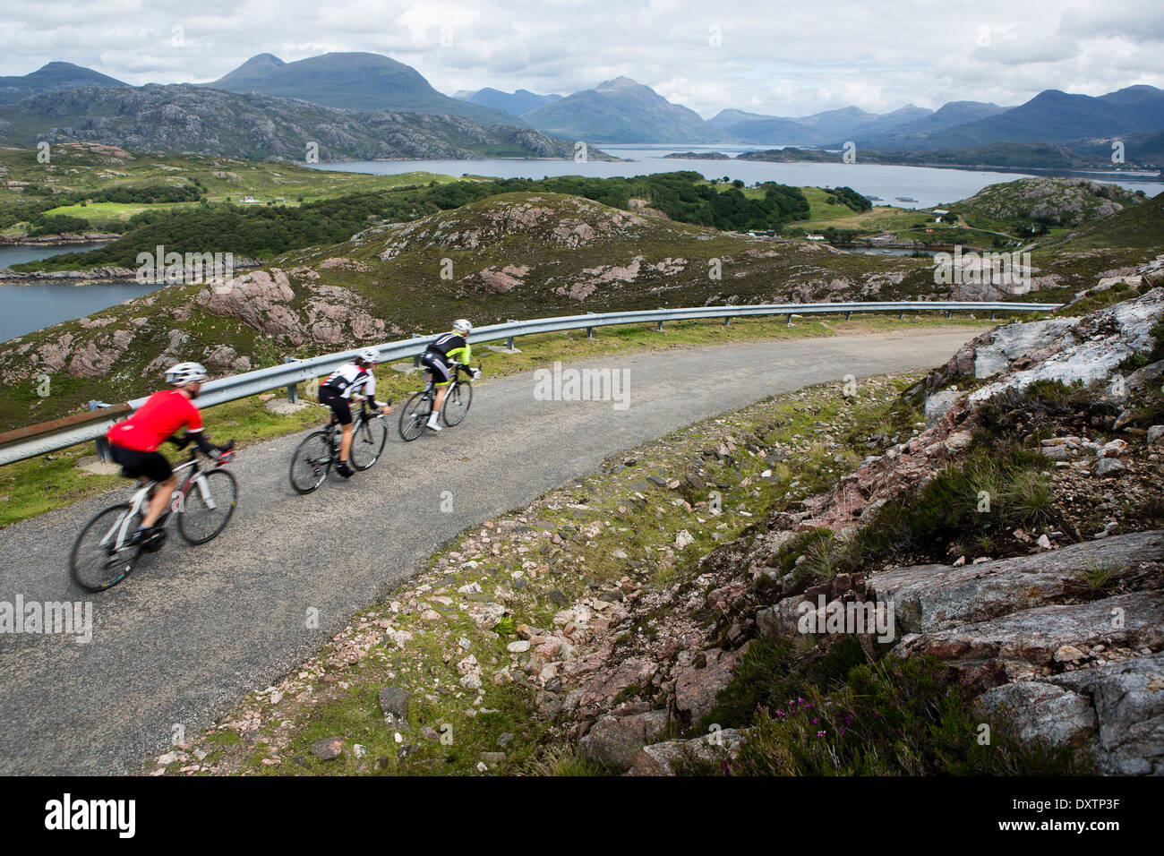 A cyclist takes on Britain's longest road climb in Lochcarron, Scotland ...