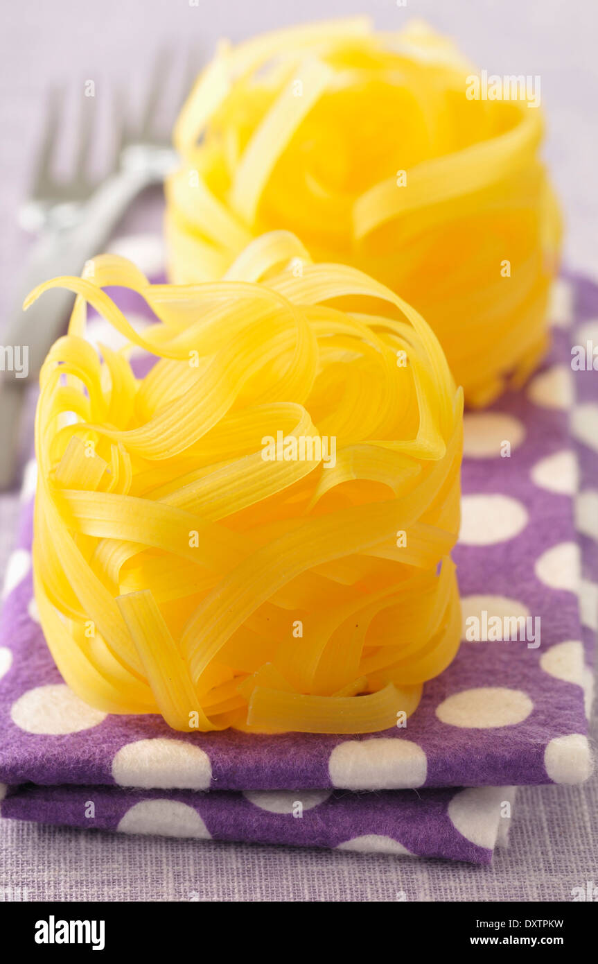 Corn tagliatelle nests Stock Photo - Alamy