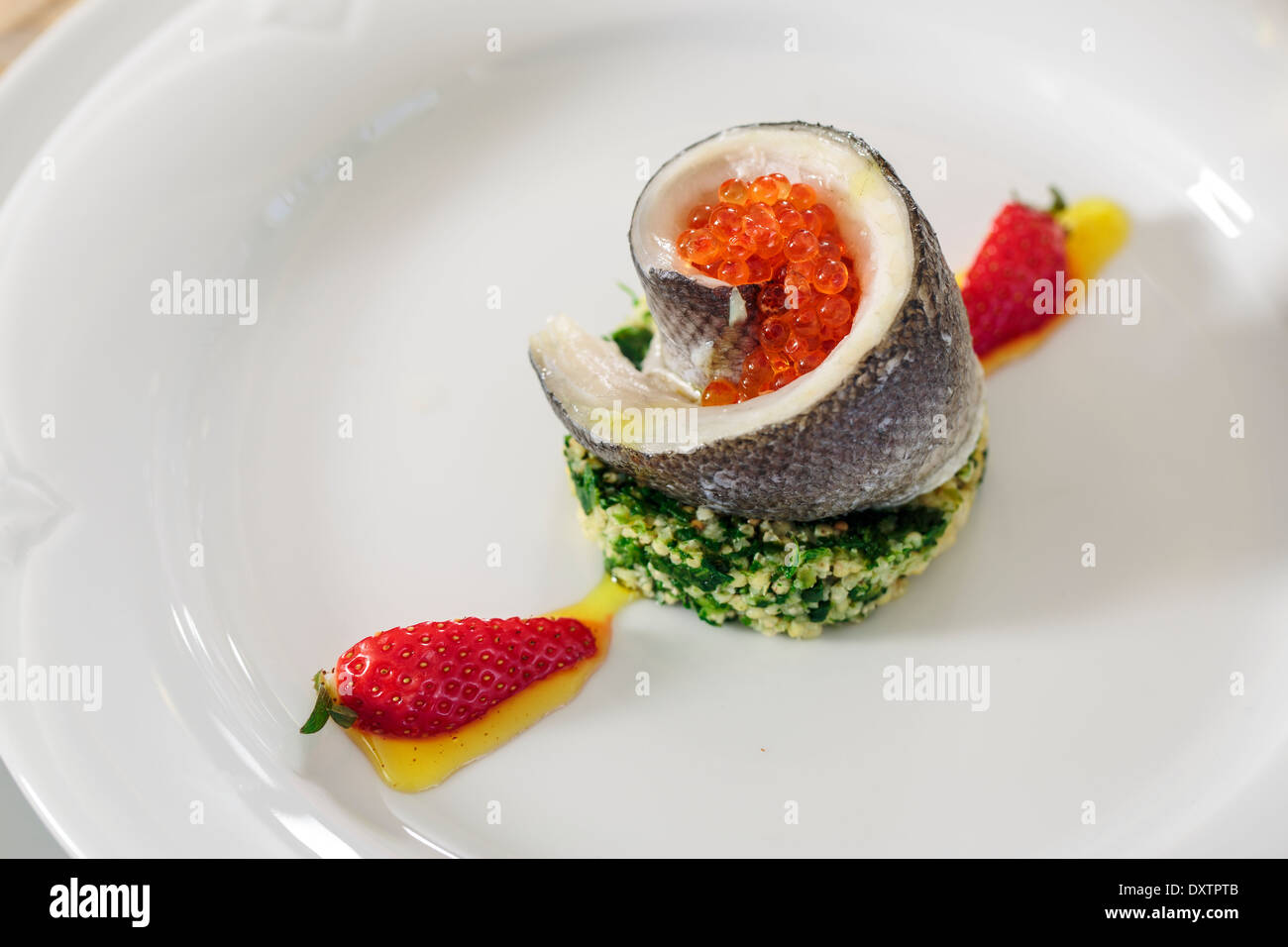 Stuffed Bass Filet on Swiss Chard Stock Photo - Alamy