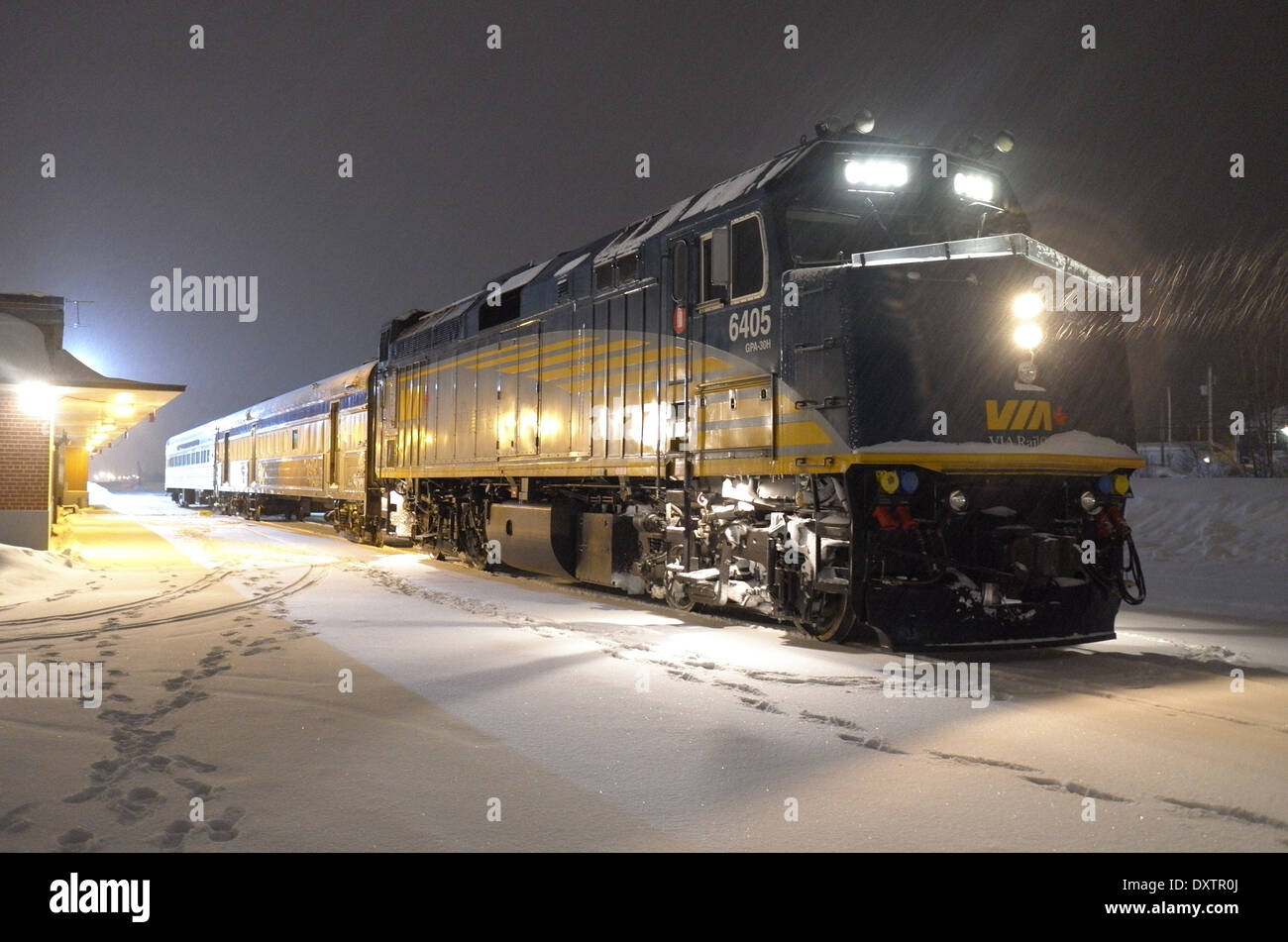 Night photo of Rail Canada Train preparing for departure during light ...