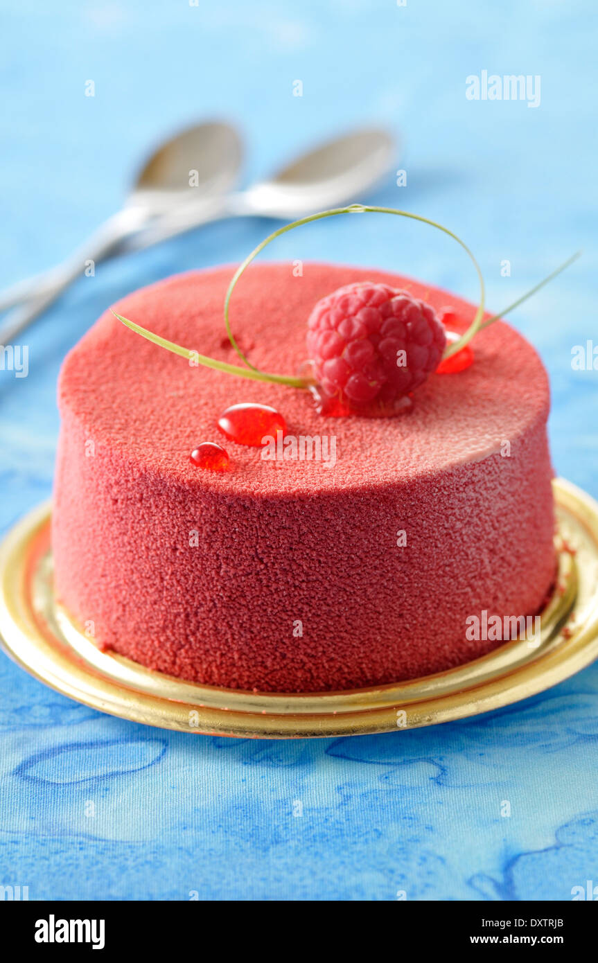 Small raspberry mousse cake Stock Photo - Alamy