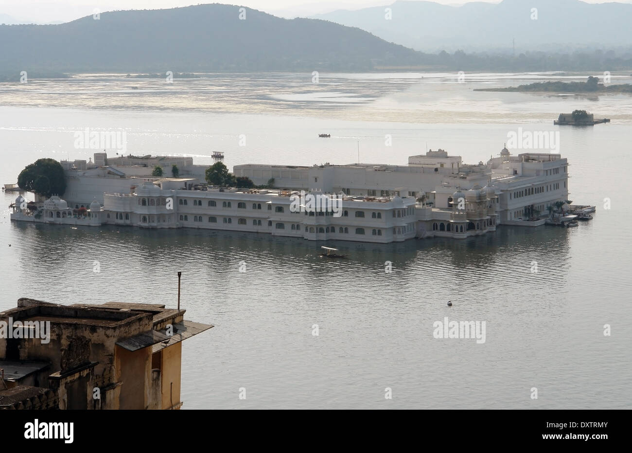 evening shot of the Lake Palace in Udaipur, a city located in Rajasthan ...