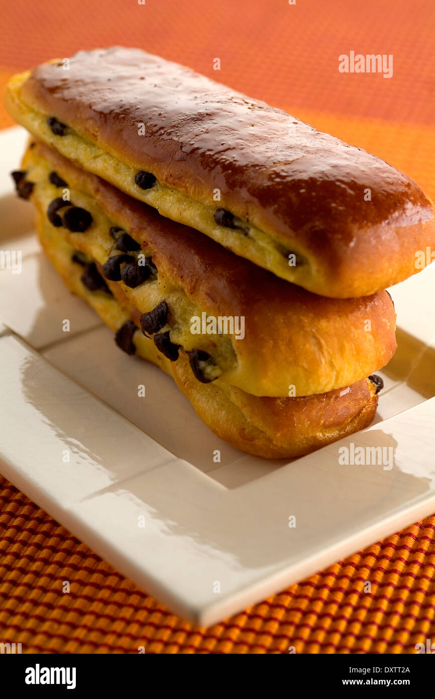 Long chocolate chip brioches Stock Photo - Alamy