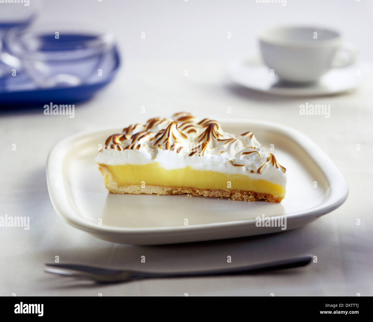 Slice of lemon meringue pie Stock Photo - Alamy
