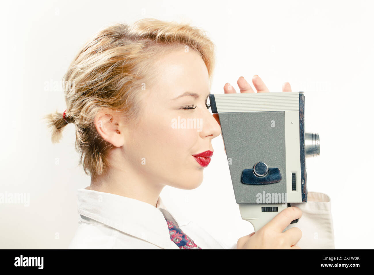 Woman with video camera hi-res stock photography and images - Alamy