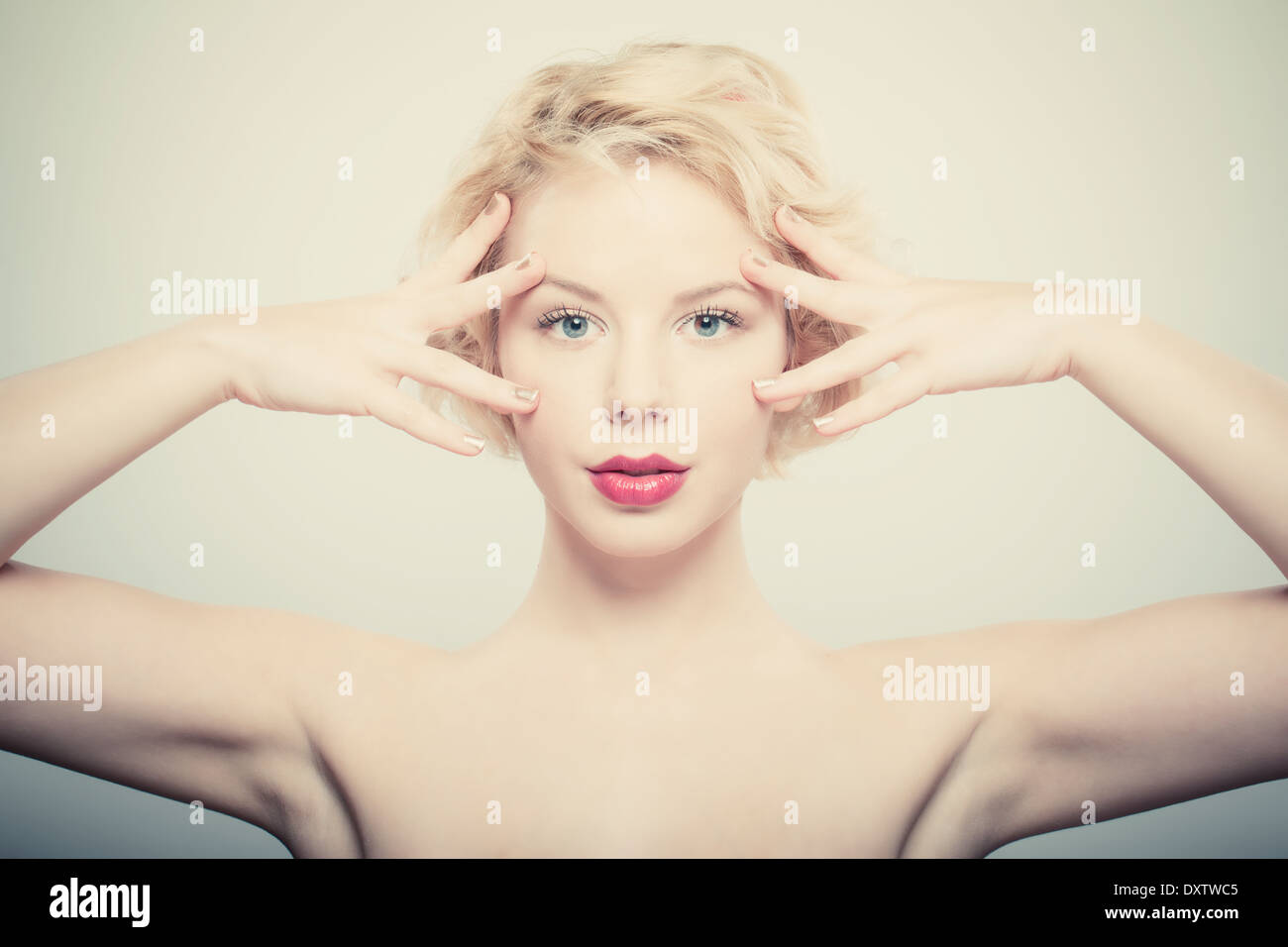 Young Woman, Hands on Head Stock Photo - Alamy