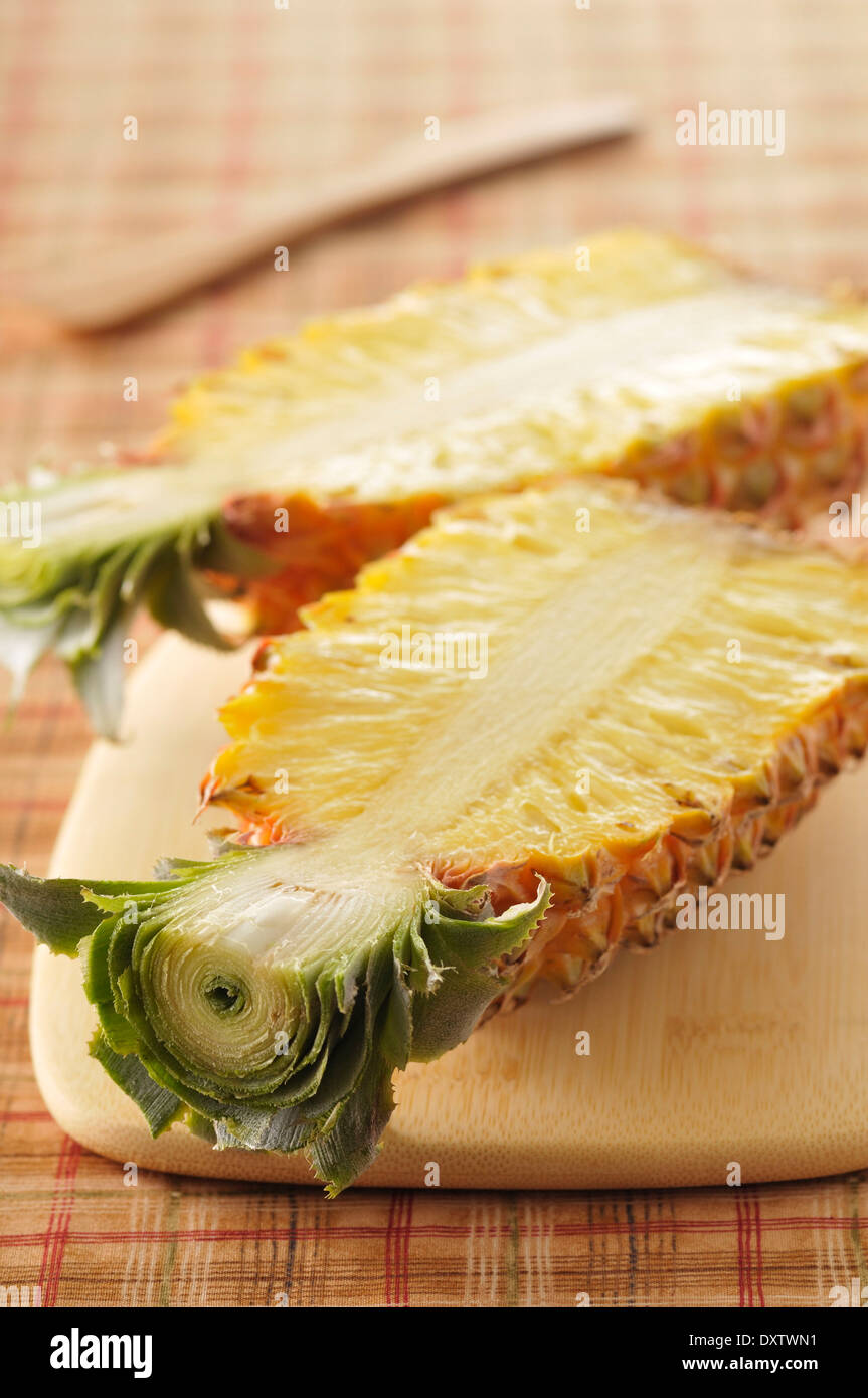 Pineapple cut in half Stock Photo - Alamy