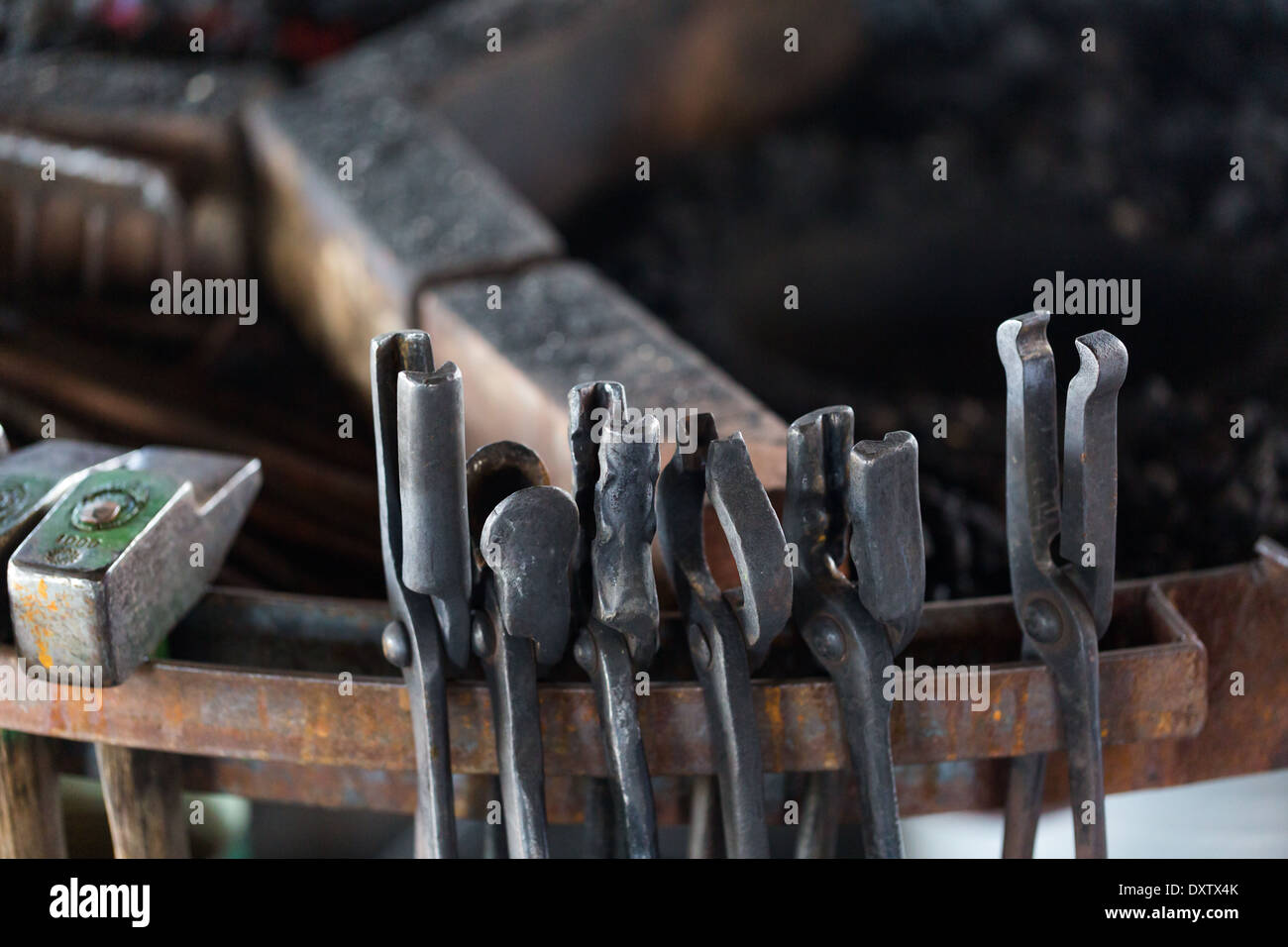 Tools of the blacksmith in blacksmith shop Stock Photo - Alamy