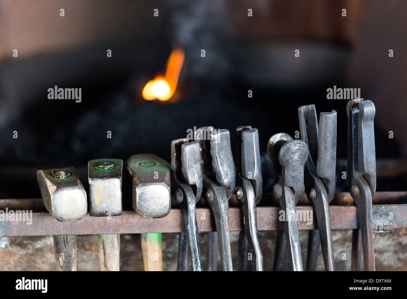 Tools of the blacksmith in blacksmith shop Stock Photo - Alamy