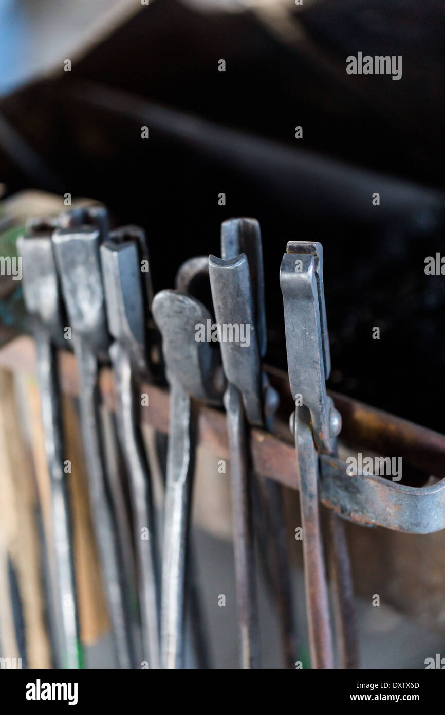 Tools of the blacksmith in blacksmith shop Stock Photo - Alamy